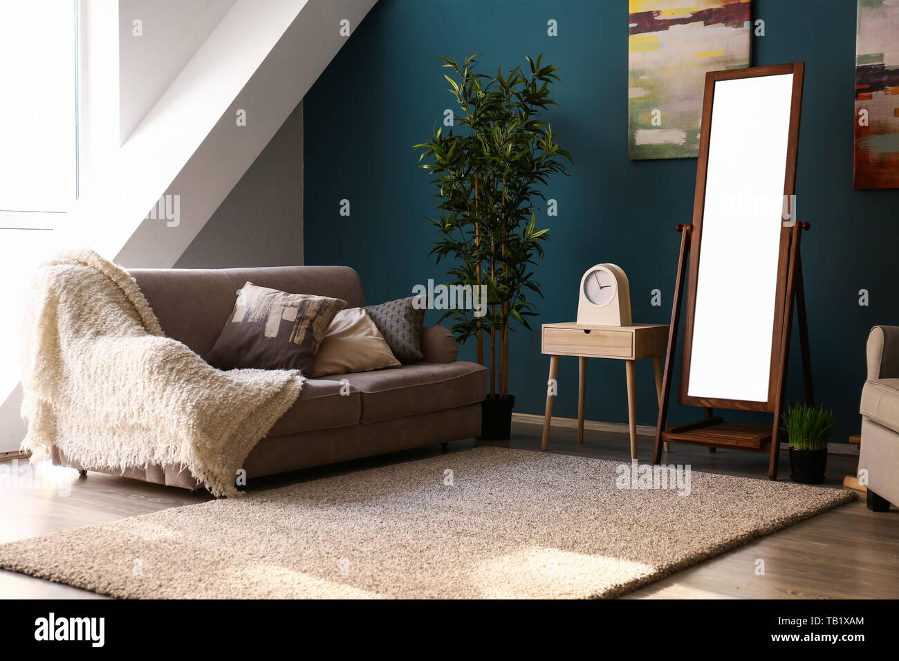 Interior of beautiful room with big mirror Stock Photo - Alamy