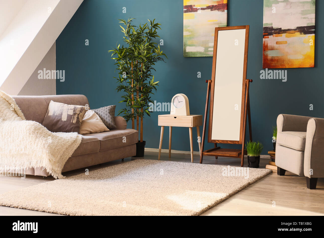 Interior of beautiful room with big mirror Stock Photo - Alamy