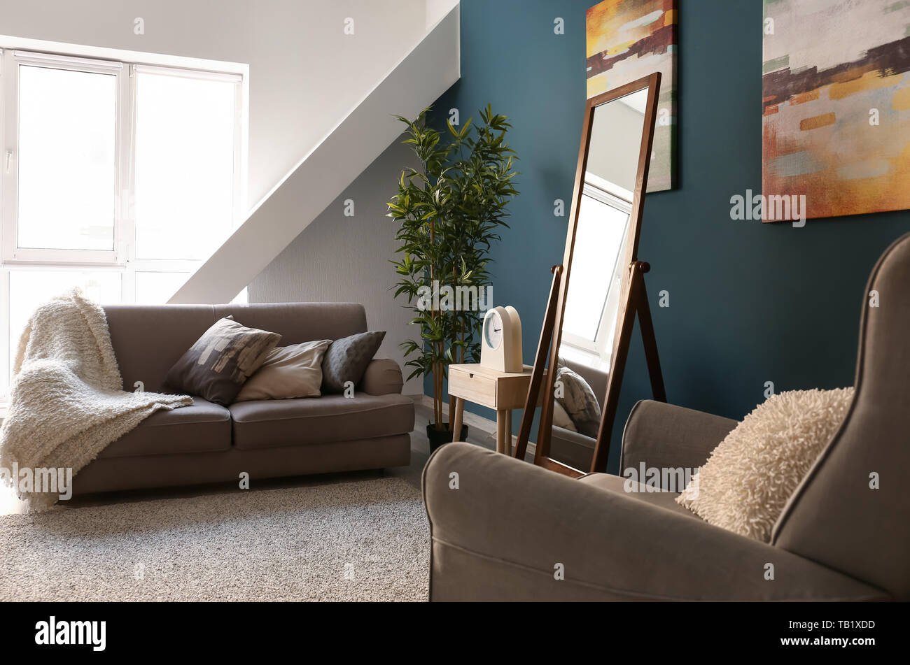 Interior of beautiful room with big mirror Stock Photo - Alamy