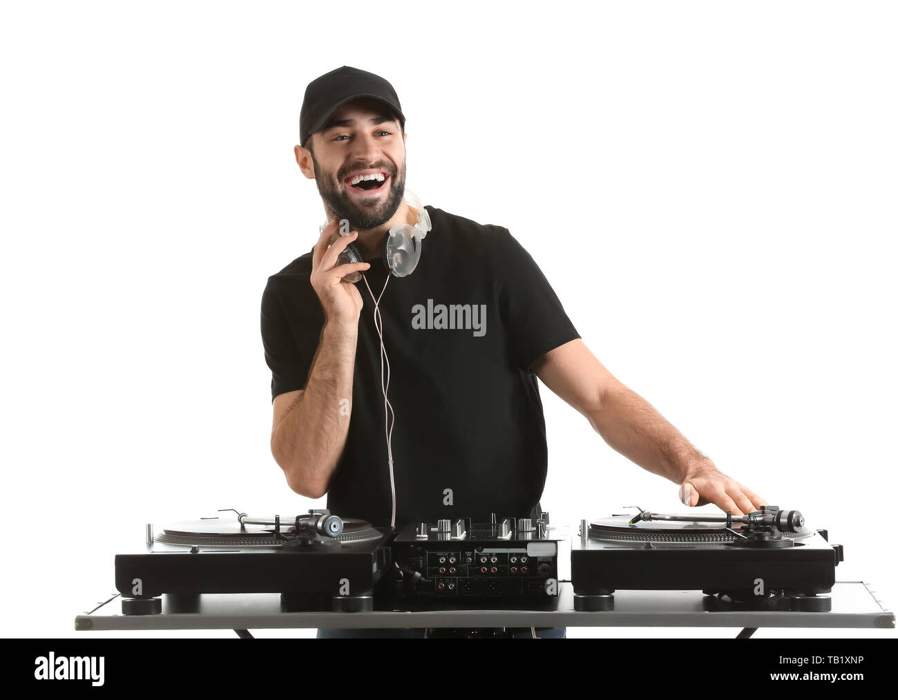 Male DJ playing music on white background Stock Photo - Alamy