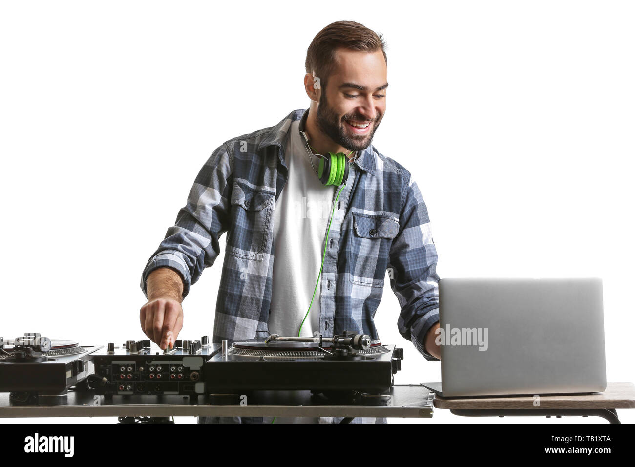 Male DJ playing music on white background Stock Photo - Alamy