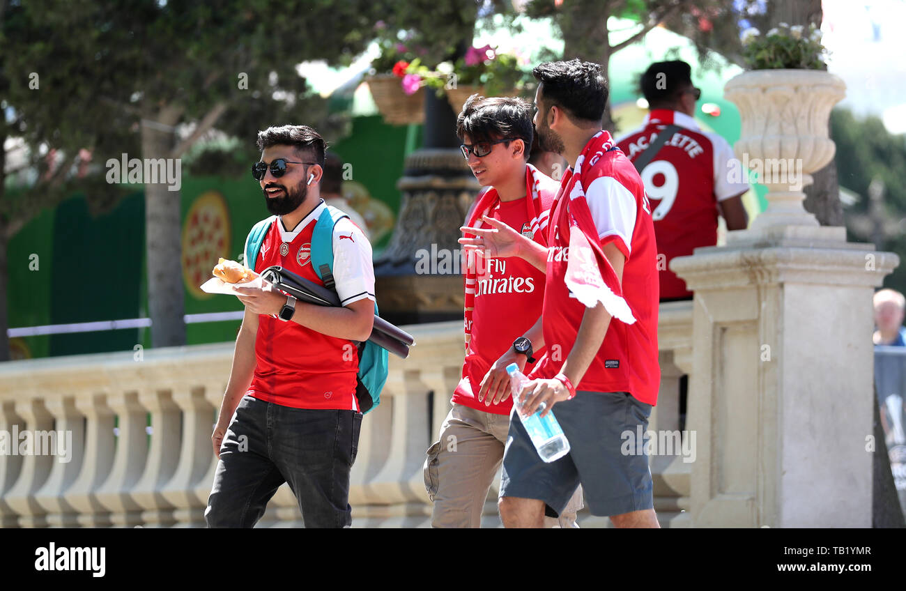 Arsenal fans enjoy a bite to eat prior to the UEFA Europa League final ...