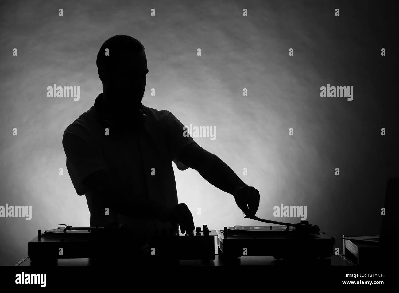 Dj playing music on vinyl Black and White Stock Photos & Images - Alamy