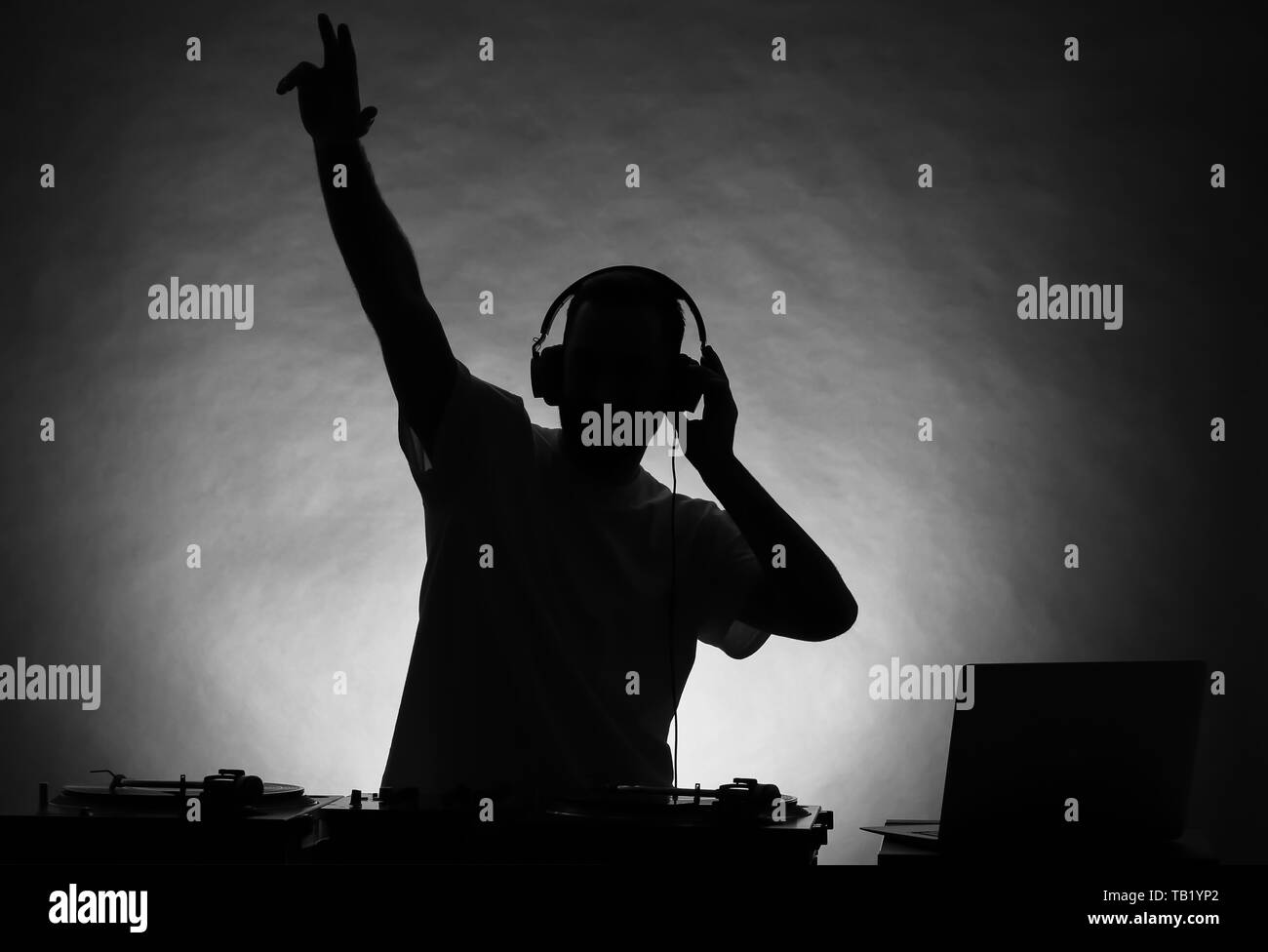 Dj playing music on vinyl Black and White Stock Photos & Images - Alamy