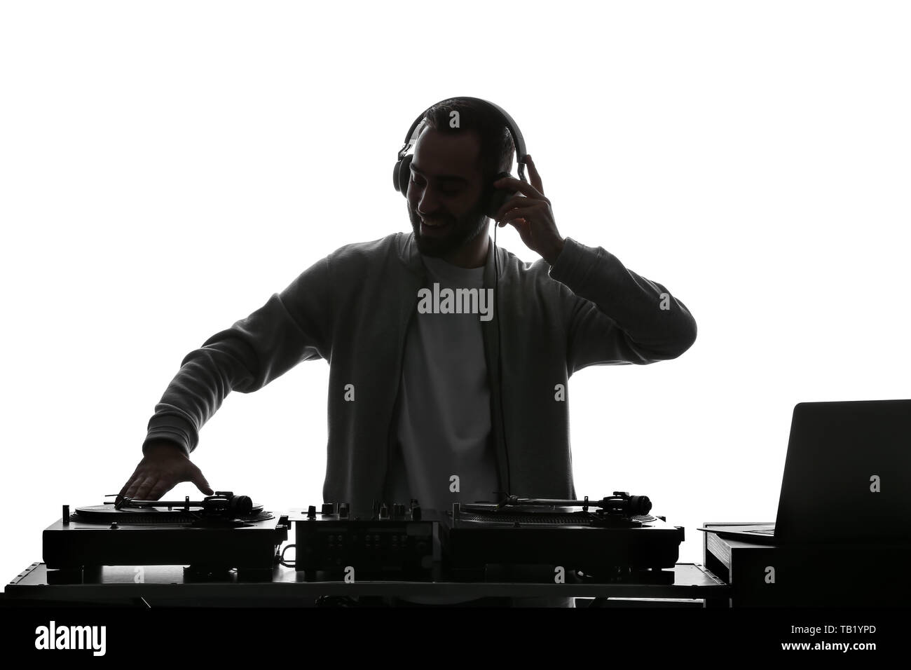 Silhouette of male DJ playing music on white background Stock Photo - Alamy