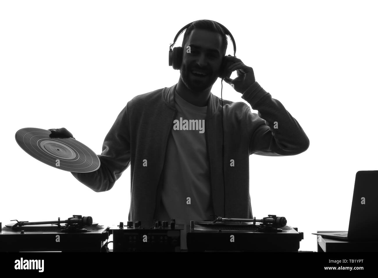 Silhouette of male DJ playing music on white background Stock Photo - Alamy
