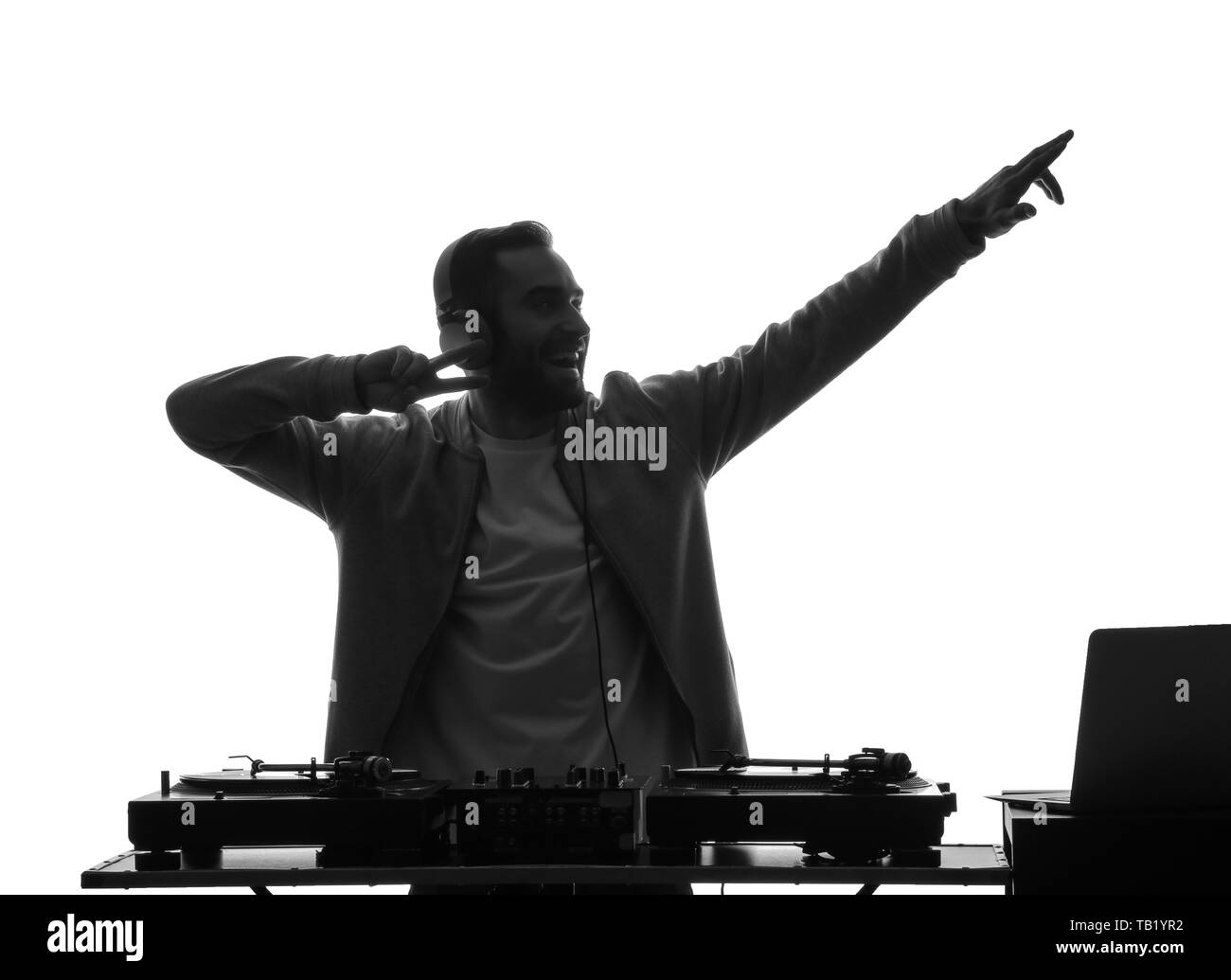 Silhouette of male DJ playing music on white background Stock Photo - Alamy