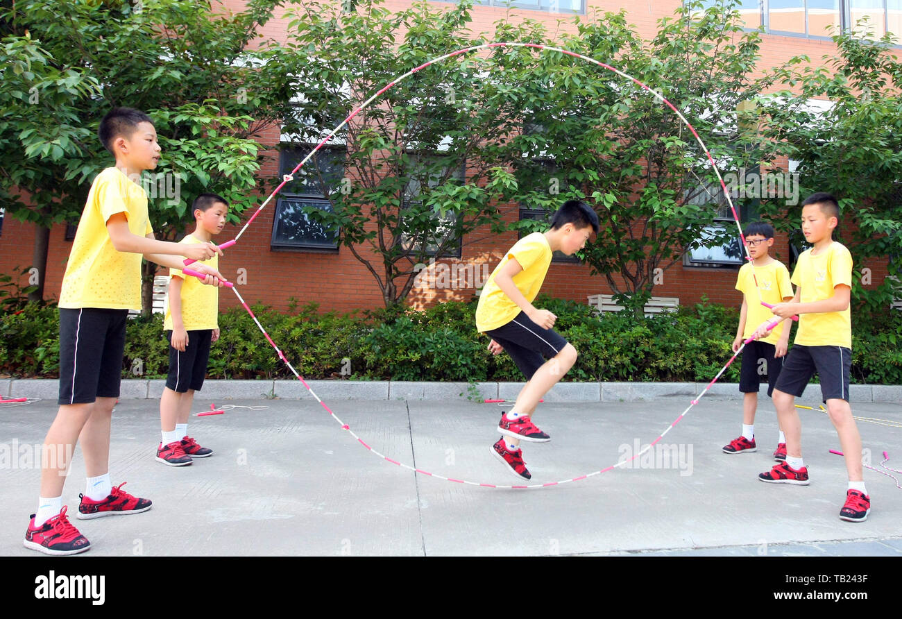 Nantong, China's Jiangsu Province. 29th May, 2019. Students play Double ...