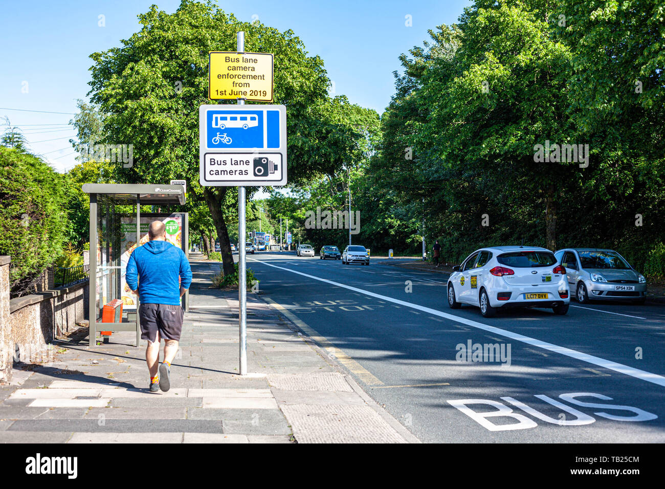Bus lane and warning signs hi-res stock photography and images - Alamy