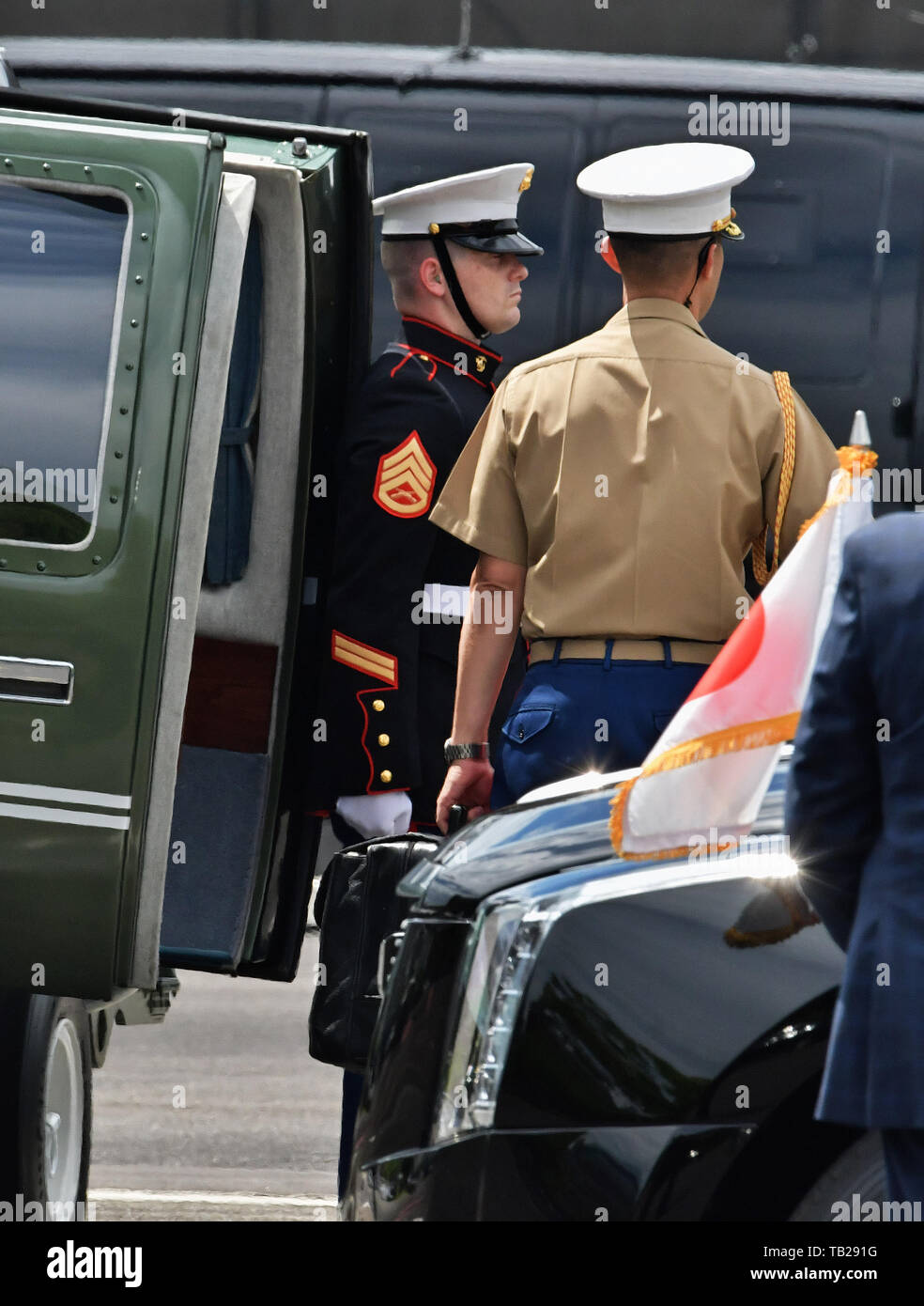 U.S. President's Military Aide is seen carries nuclear football case at ...