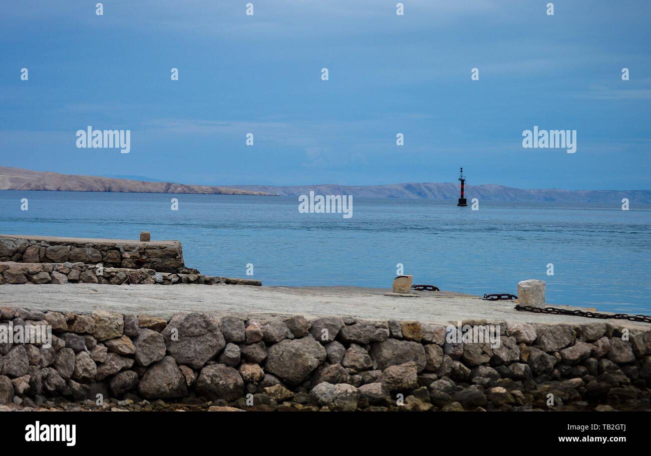 Stone moles in Prizna harbor, Croatia Stock Photo - Alamy