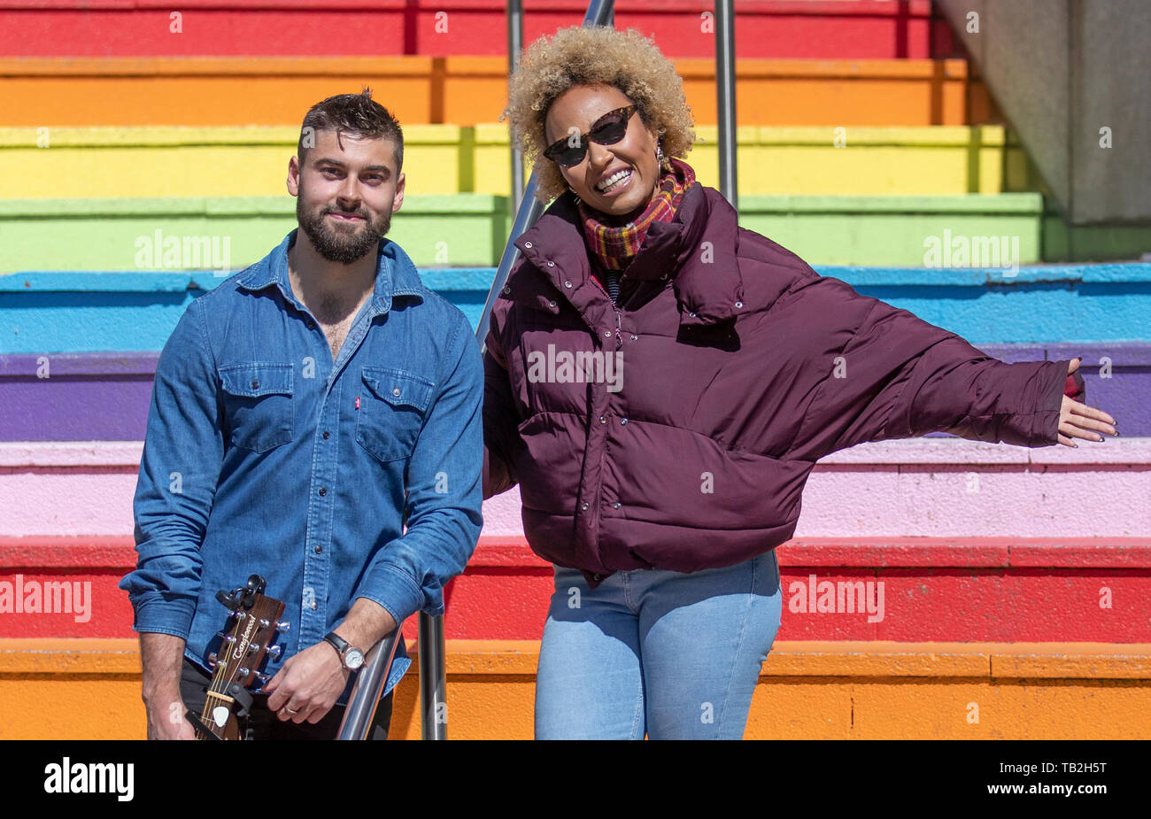 Singer-songwriter Emeli Sande with busking musician Finn Henderson ...