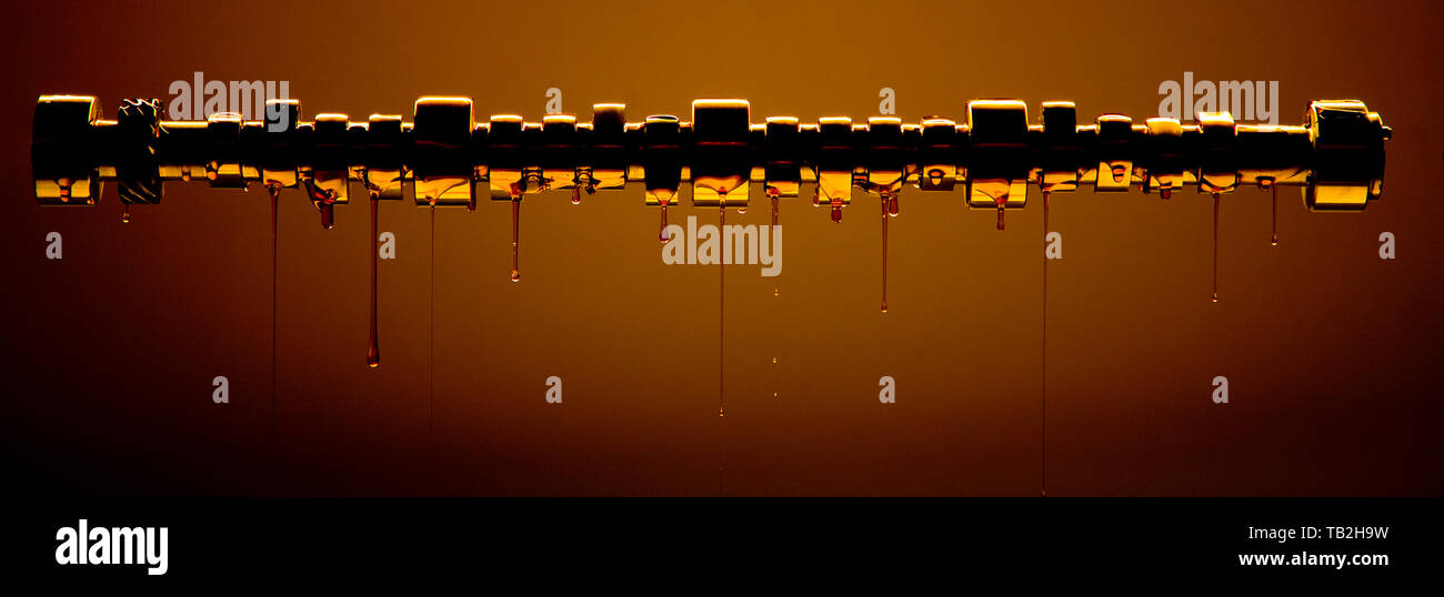 Oil dripping from camshaft Stock Photo - Alamy
