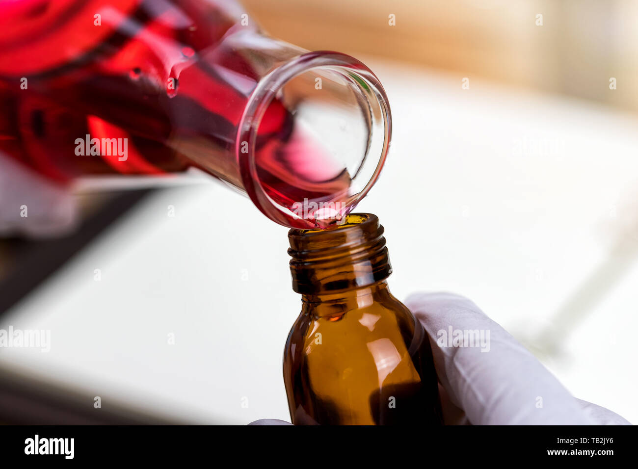 Scientist Pouring Chemicals High Resolution Stock Photography and ...