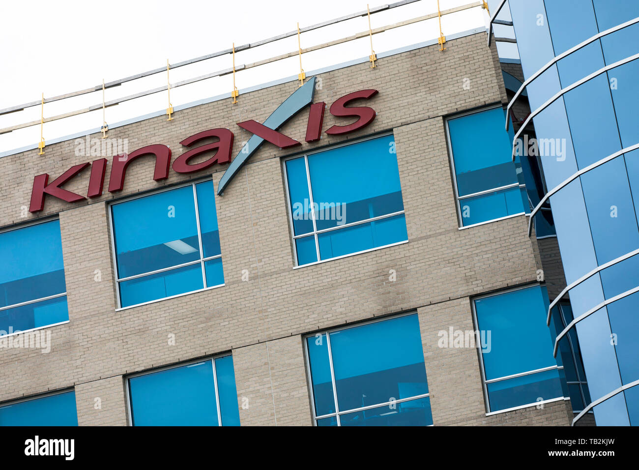 A logo sign outside of the headquarters of Kinaxis in Ottawa, Ontario ...
