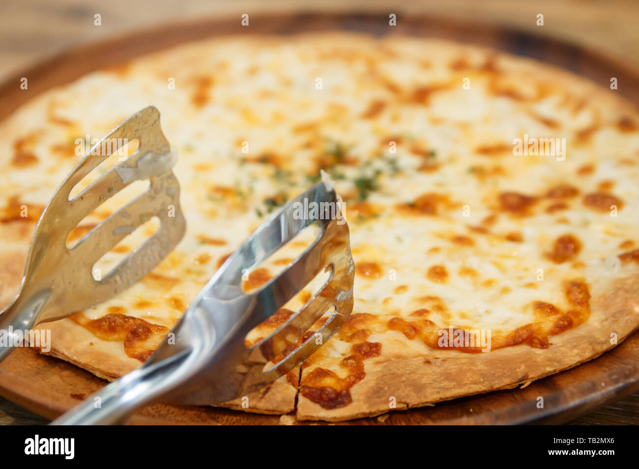 Tongs for food hi-res stock photography and images - Alamy