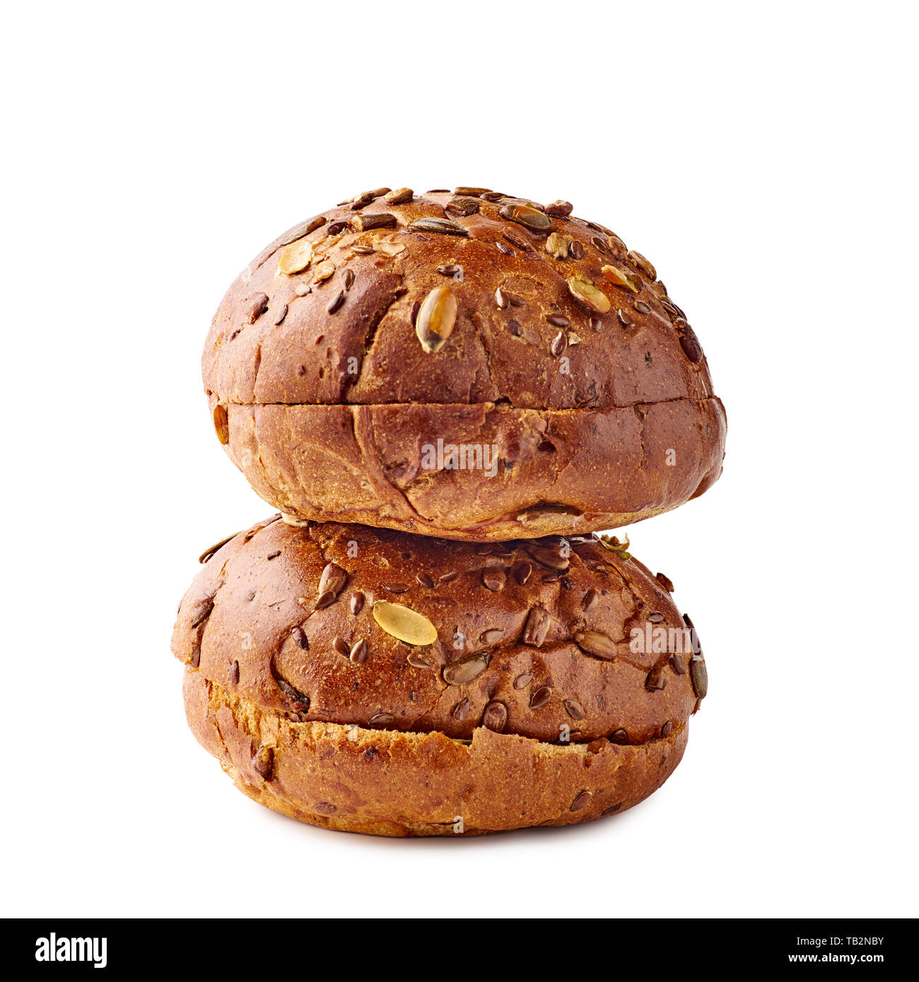 Two brown burger buns on white background Stock Photo - Alamy