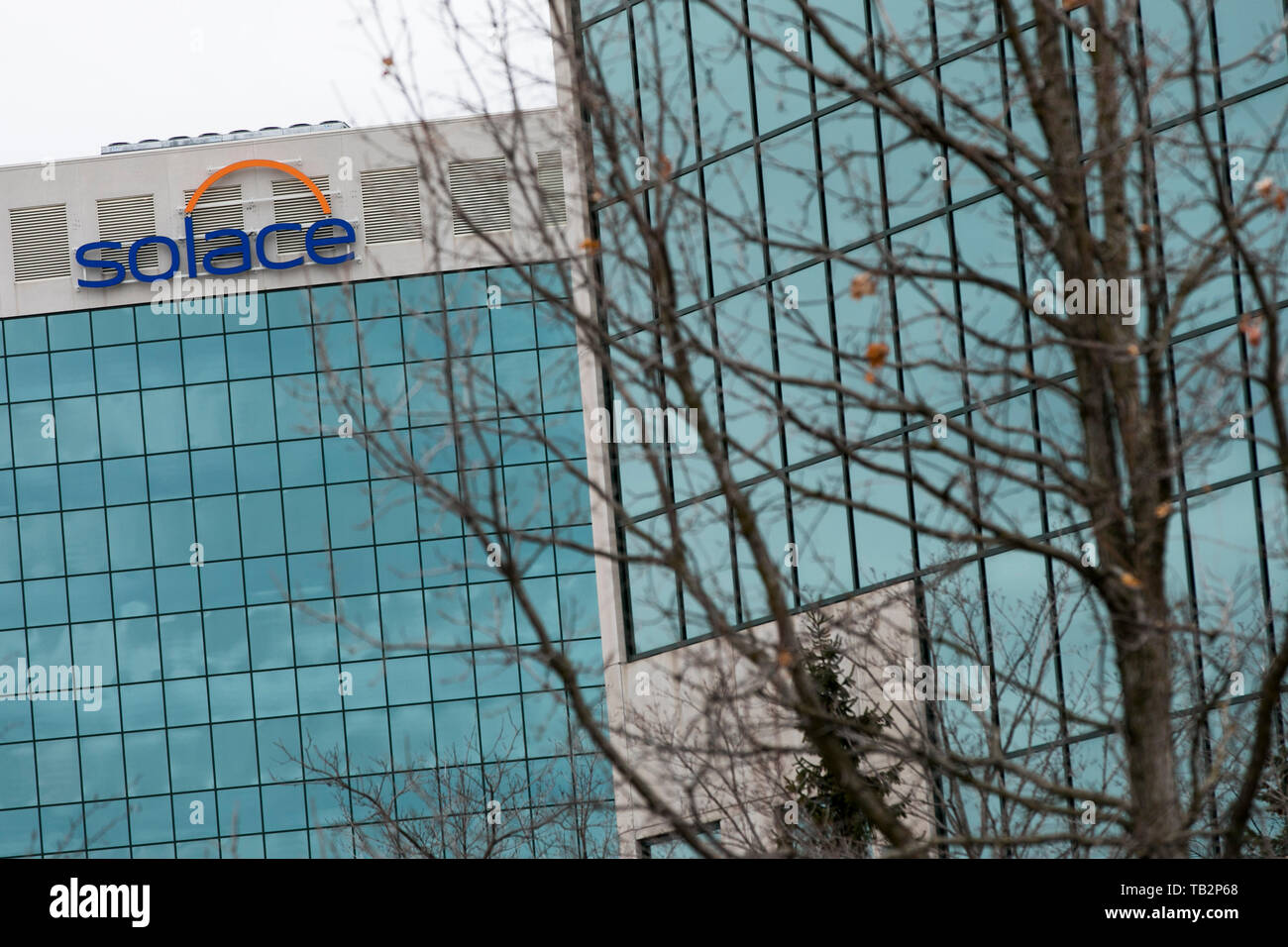 A logo sign outside of the headquarters of the Solace Corporation in ...