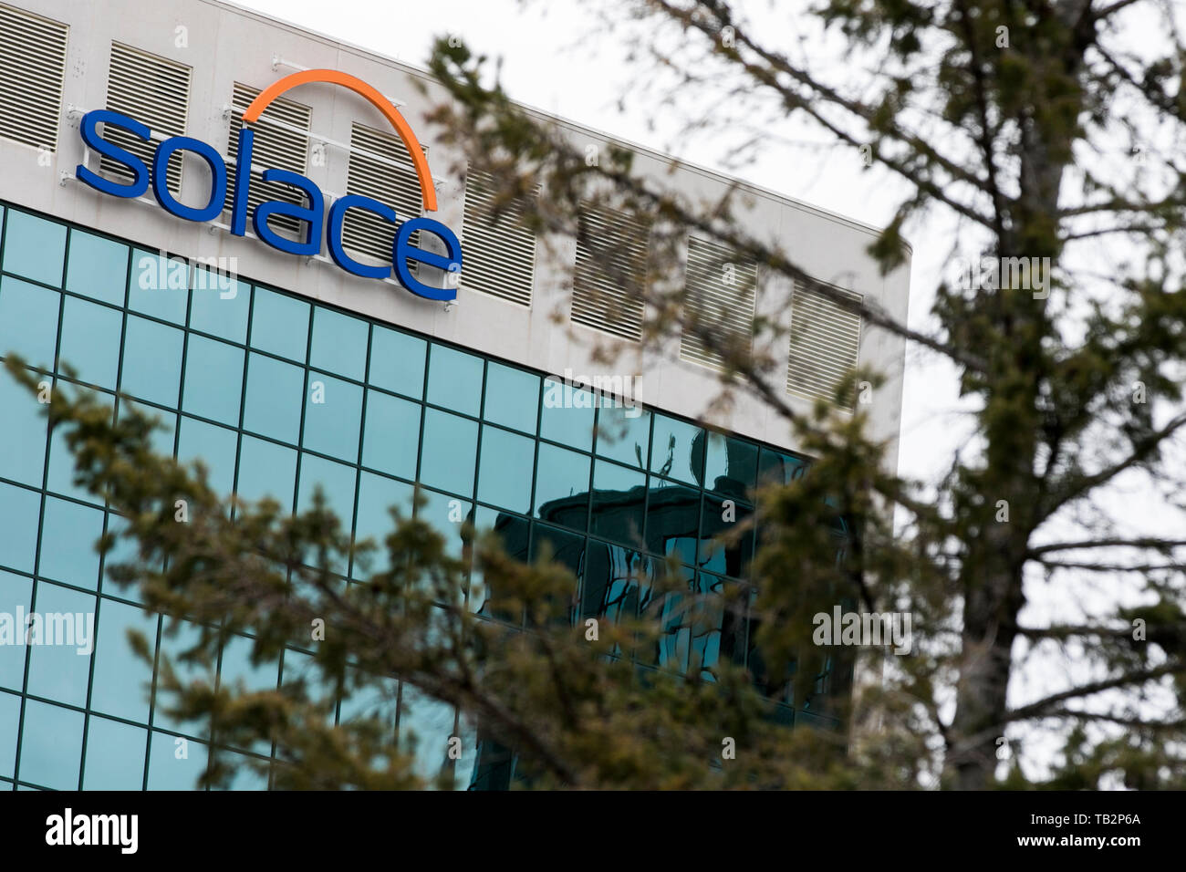 A logo sign outside of the headquarters of the Solace Corporation in ...