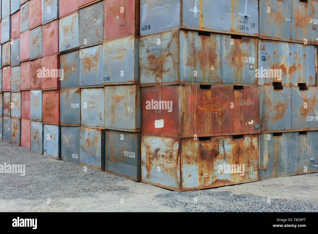 Stack of rusty metal containers Stock Photo - Alamy