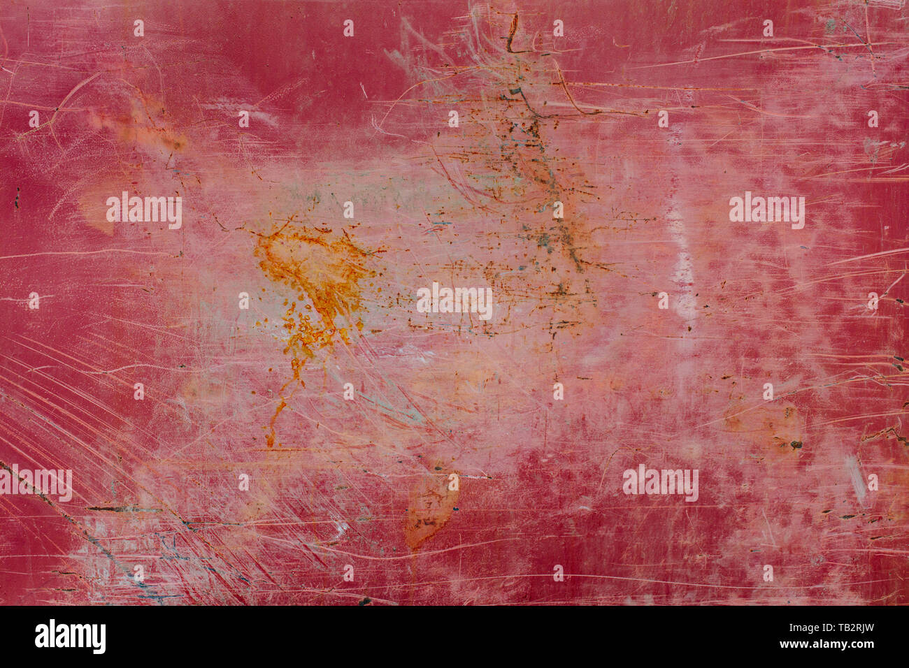 Painted red metal with rust and scratch markings Stock Photo - Alamy