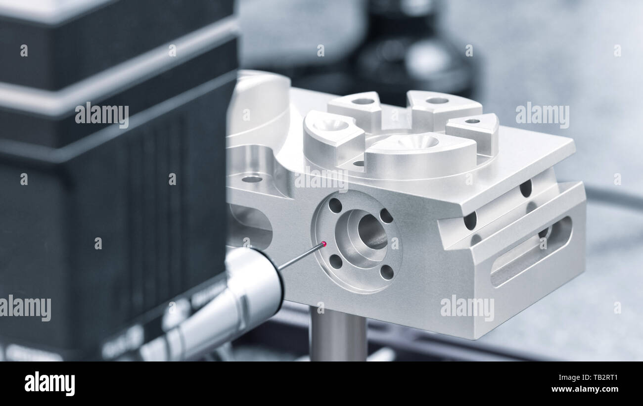 Operator inspection dimension metal parts by CMM after machining ...