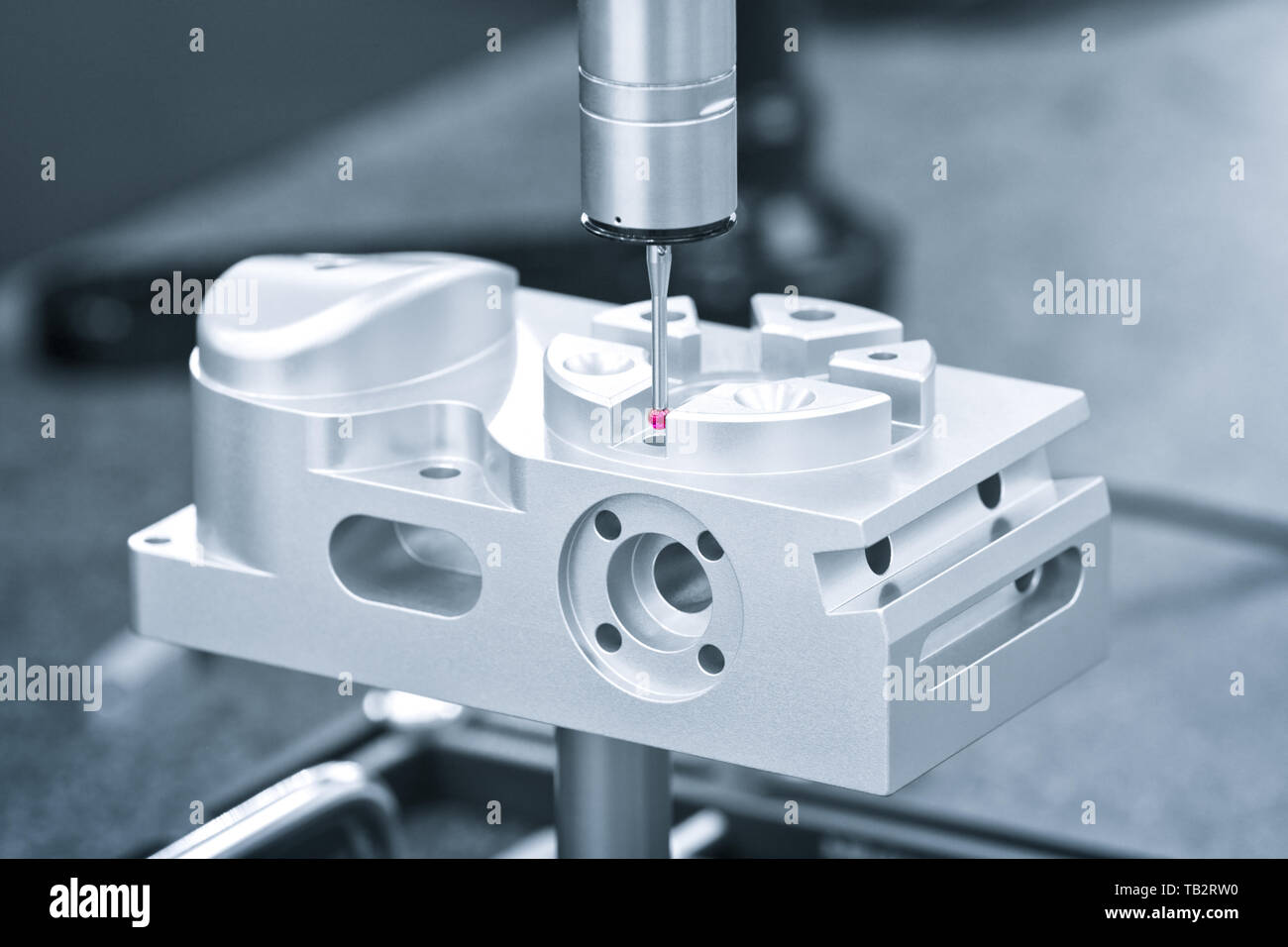 Operator inspection dimension metal parts by CMM after machining ...