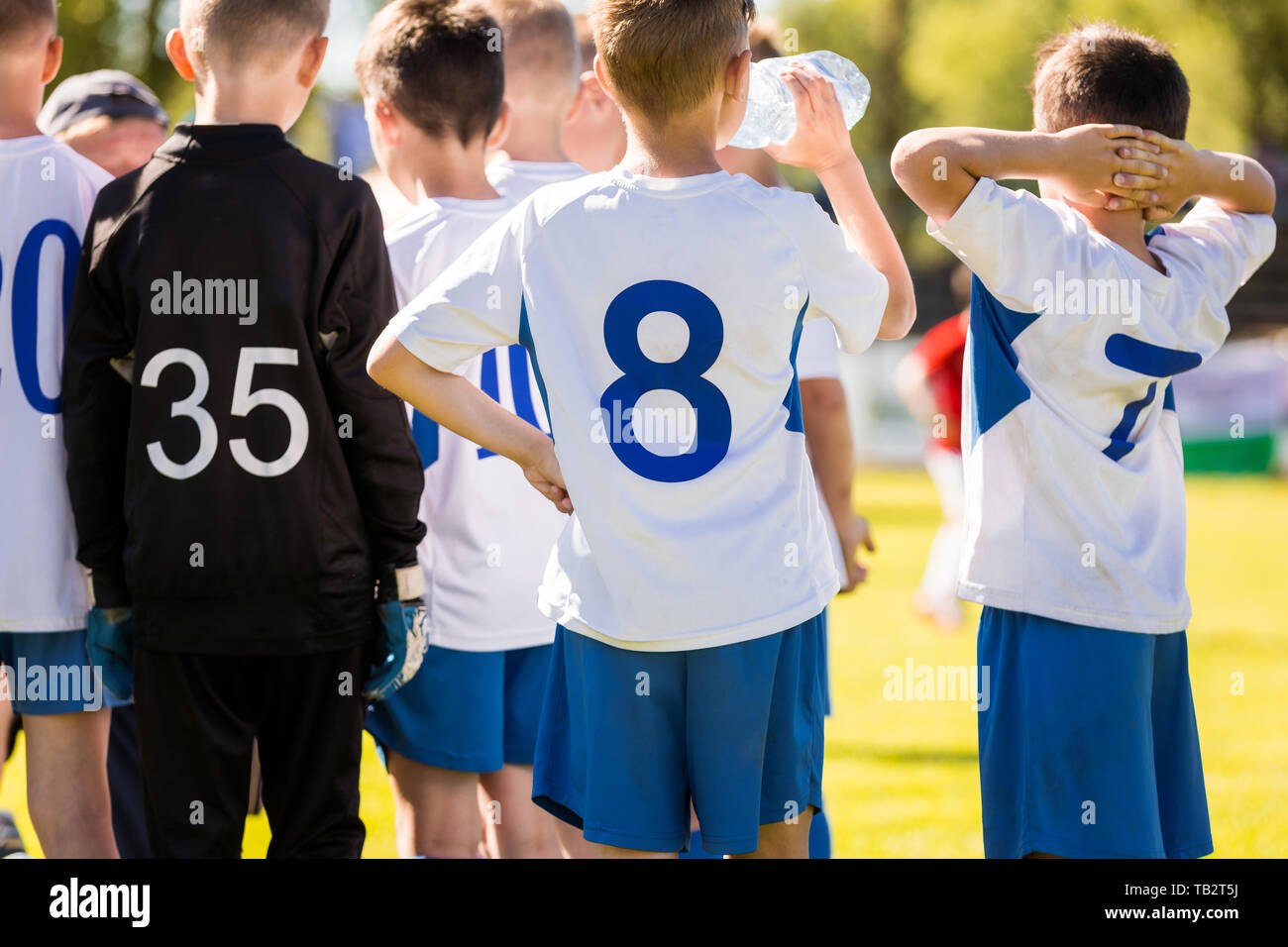 Boy Soccer Player Drinking Water from a Water Bottle During Soccer Half ...
