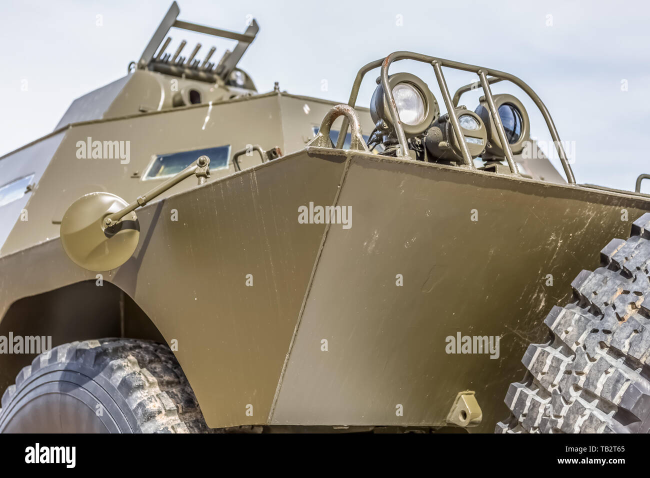 Detailed front view of old armored military vehicle, white background ...