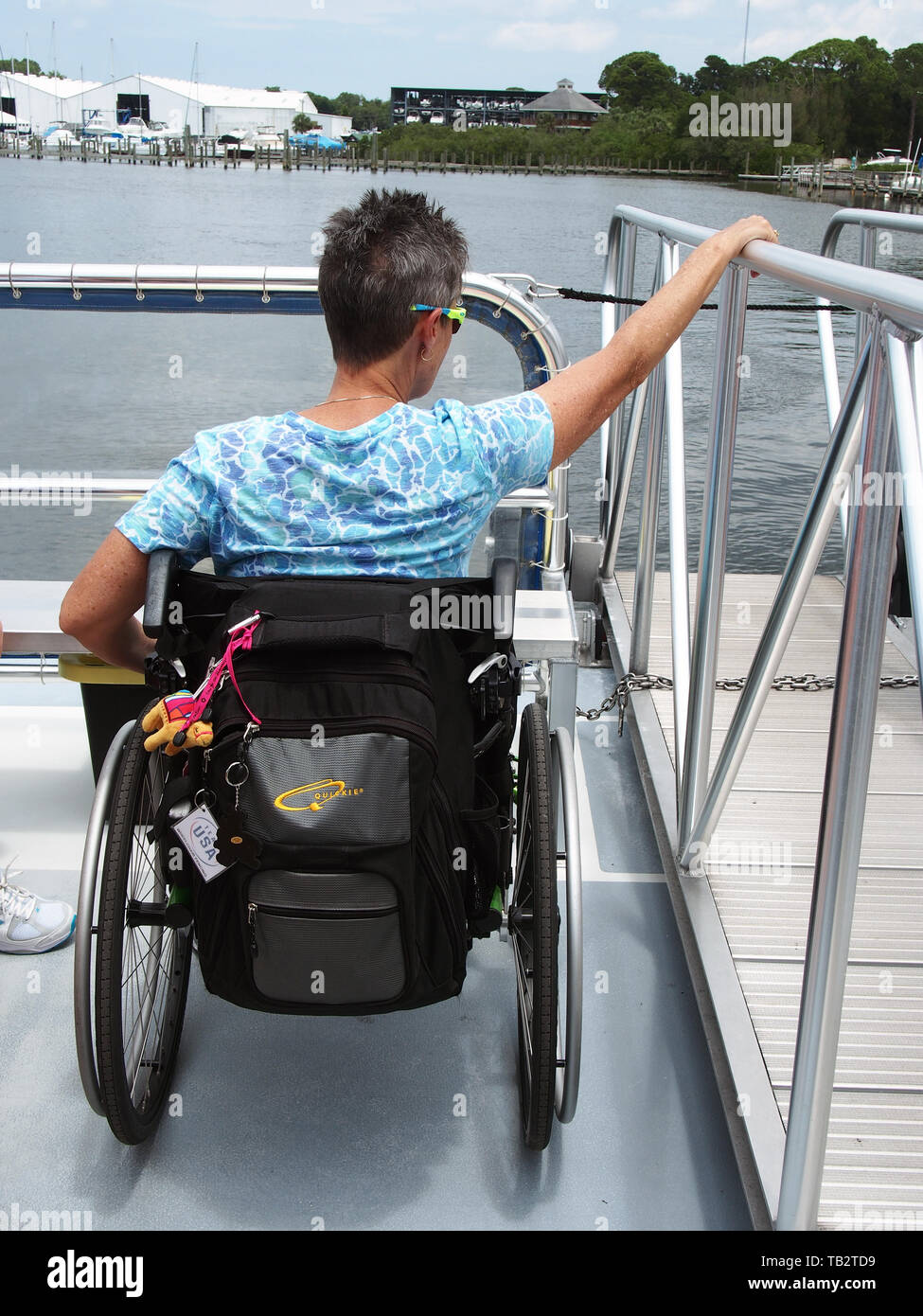 Disabled woman in wheelchair enjoys a boat ride, Florida, USA, May 9 ...