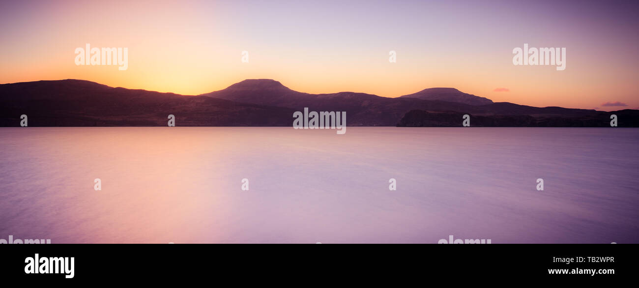 Isle of Skye landscape - sunset over ocean and mountains Stock Photo ...