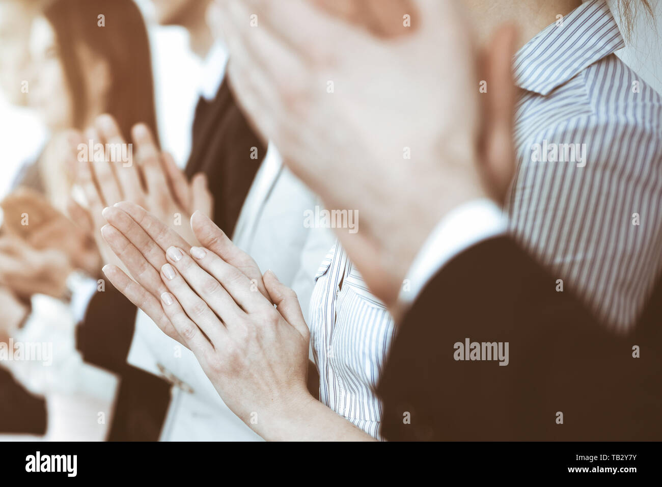 Business people clapping and applause at meeting or conference, close ...