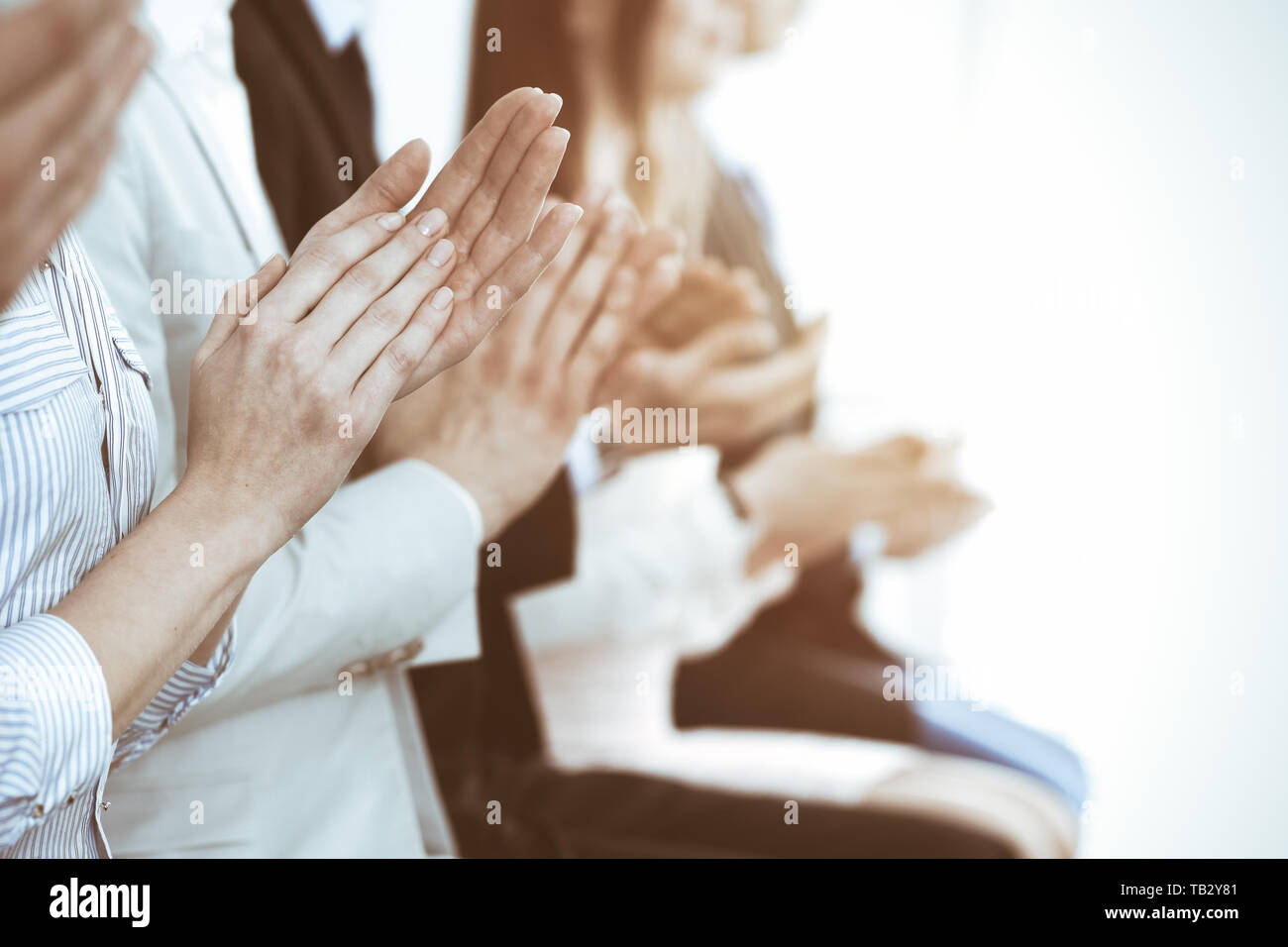 Business people clapping and applause at meeting or conference, close ...
