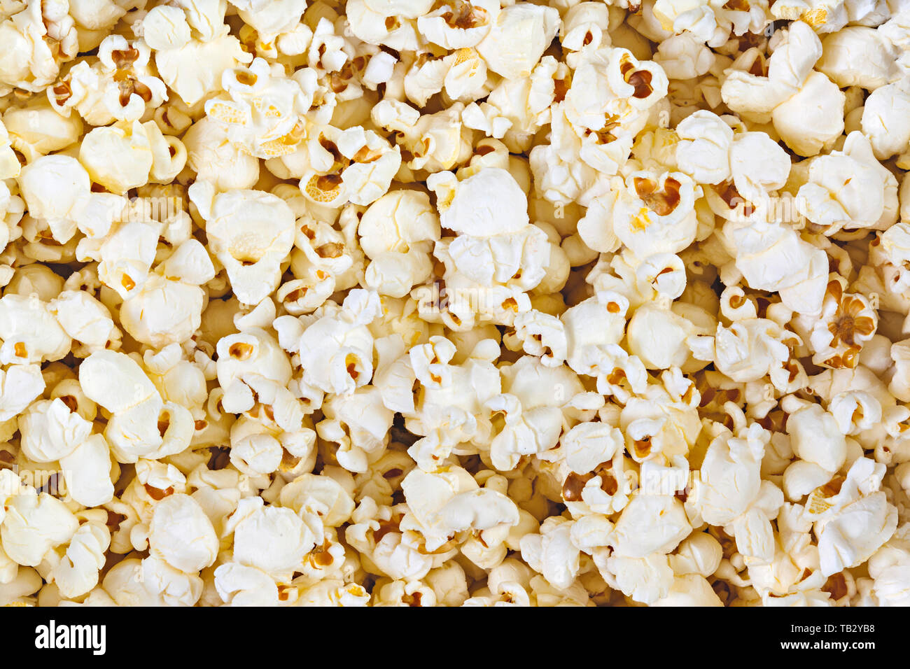 Full frame top view of popcorn background Stock Photo - Alamy