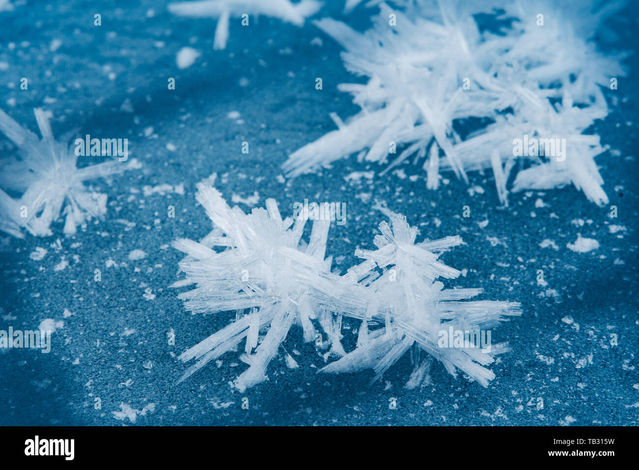 beautiful ice cristals on frozen lake taken at Oeschinensee in Berner ...
