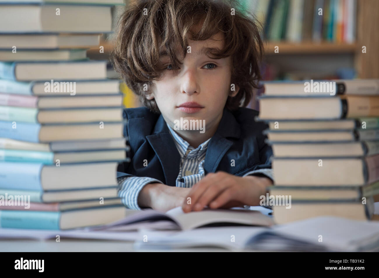 education, childhood and school concept. Boy do his homework Stock ...