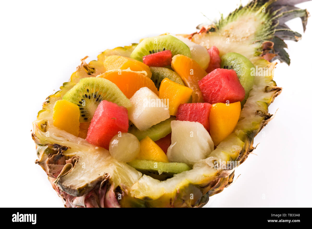 Mix fruit served inside pineapple isolated on white background Stock ...