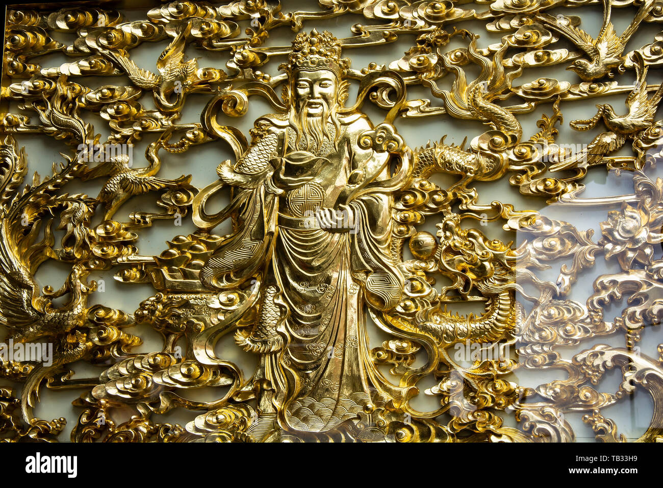 Religious fine Gold Art work in China Stock Photo - Alamy