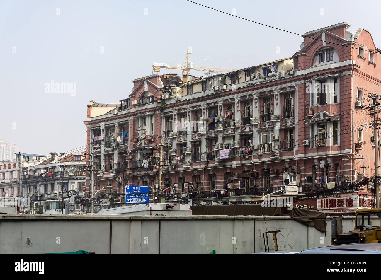 Living Scene on the Streets of Shanghai with Houses Stock Photo - Alamy