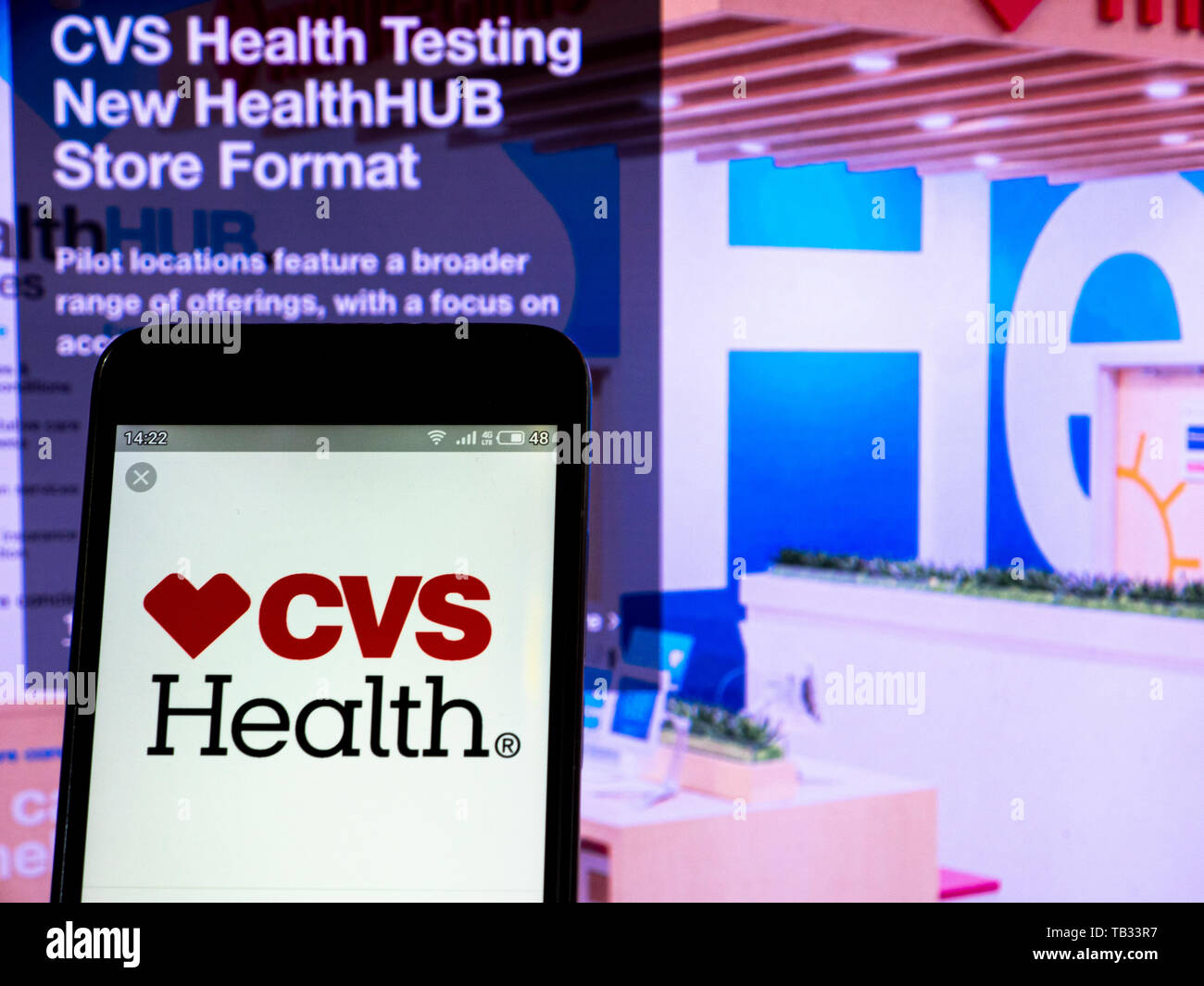 In this photo illustration the CVS Health Corporation logo is seen ...