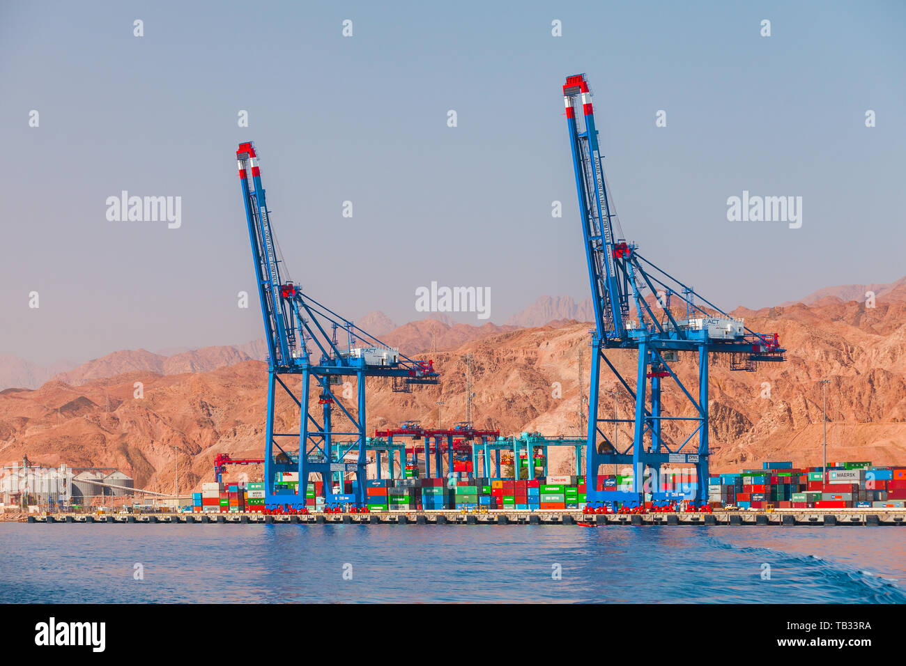 Aqaba, Jordan - May 18, 2018: Blue gantry cranes. Container terminal ...
