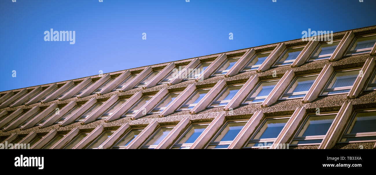 Modern office building windows with vertical lines and reflection Stock ...