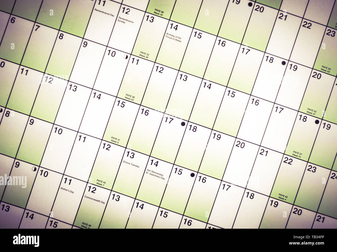 Wall calendar with days and dates isolated from blurred background ...