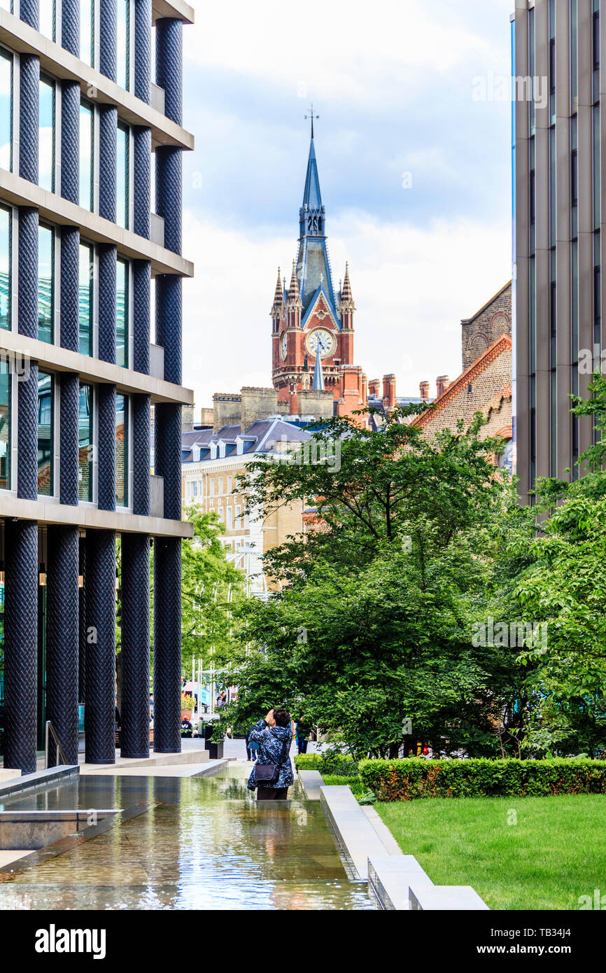 St Pancras railway station, visible between the tall buildings in ...