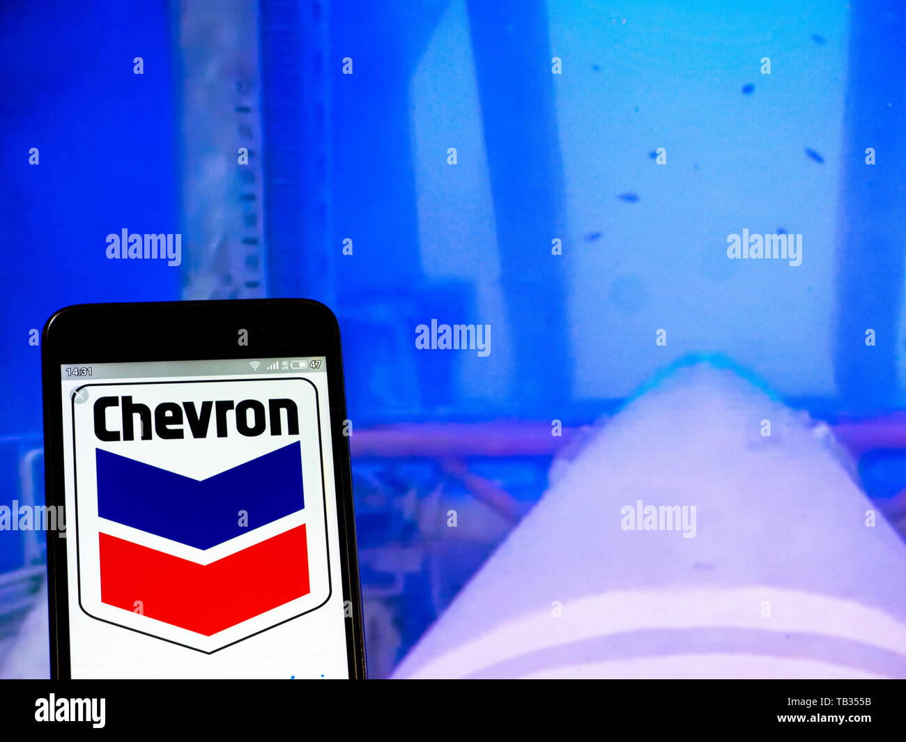 In this photo illustration the Chevron Corporation logo is seen ...