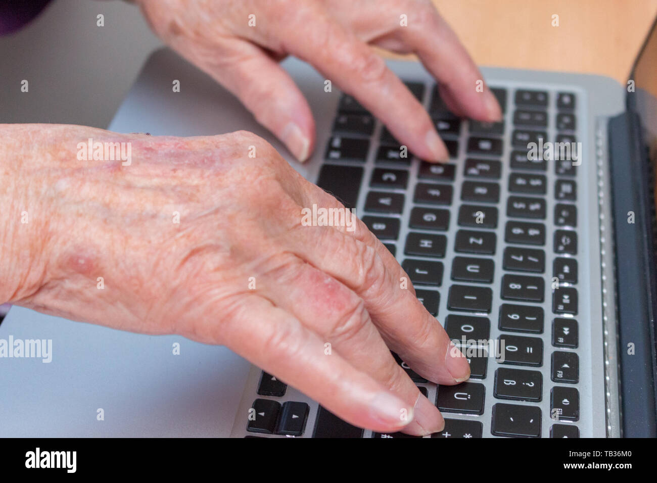 Elderly person using keyboard hi-res stock photography and images - Alamy