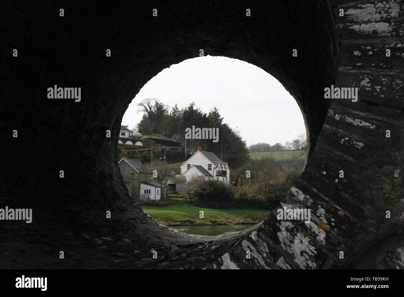 Hole in bridge at Cenarth Falls Stock Photo - Alamy