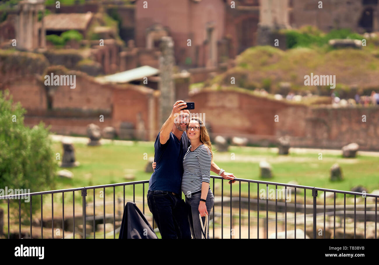 Rome, Italy - Foreign Tourist Couple Discovering the Roman Forum near ...