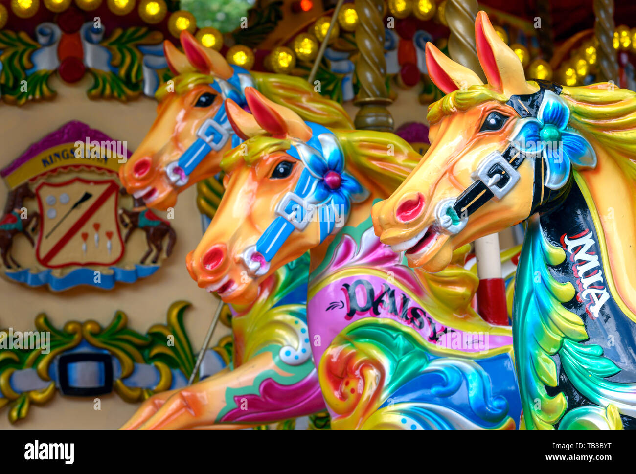 Colourful fairground carousel horses Stock Photo - Alamy