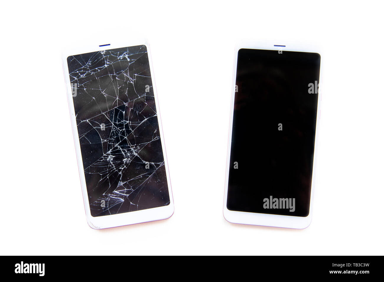 Two mobile smartphones with broken and fixed glass touch screen ...